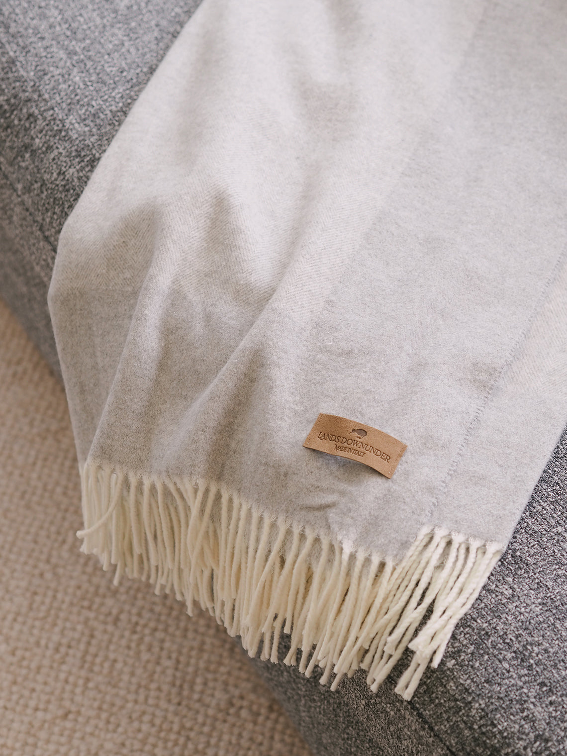 Elio Light Grey Border Throw | The Cross Living